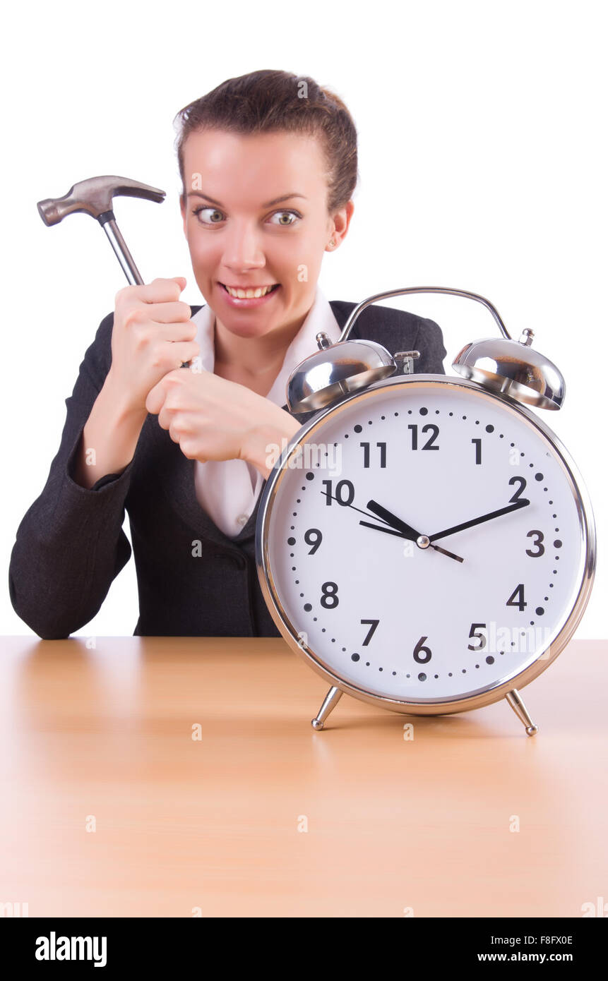 Woman trying to break the clock Stock Photo - Alamy