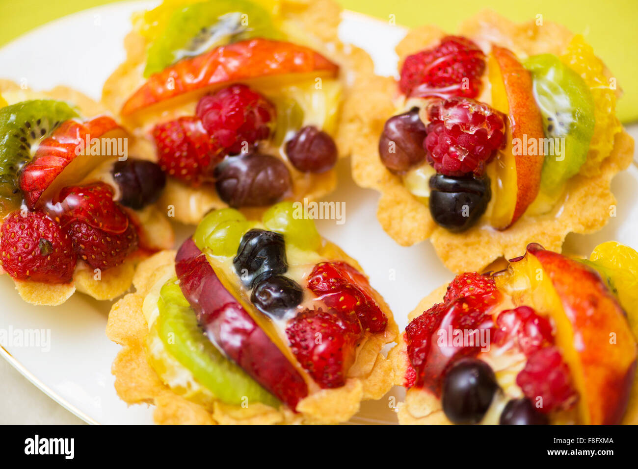 Tasty sweets in the plate Stock Photo - Alamy