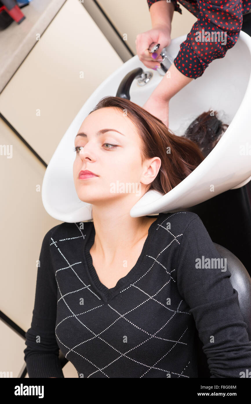 Close Up High Angle View of Young Brunette Woman Having Hair Washed by ...
