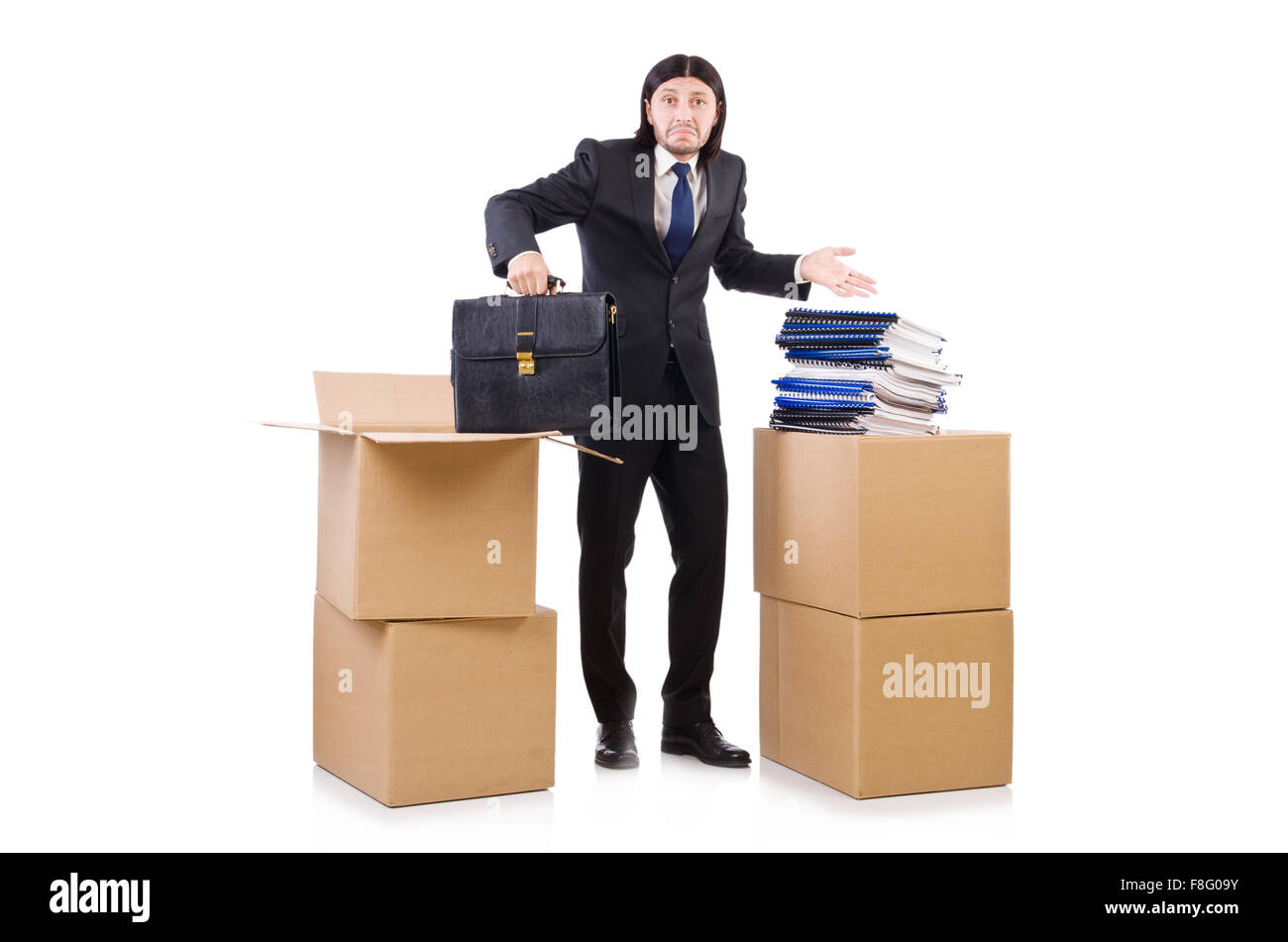 Man with boxes full of work Stock Photo - Alamy