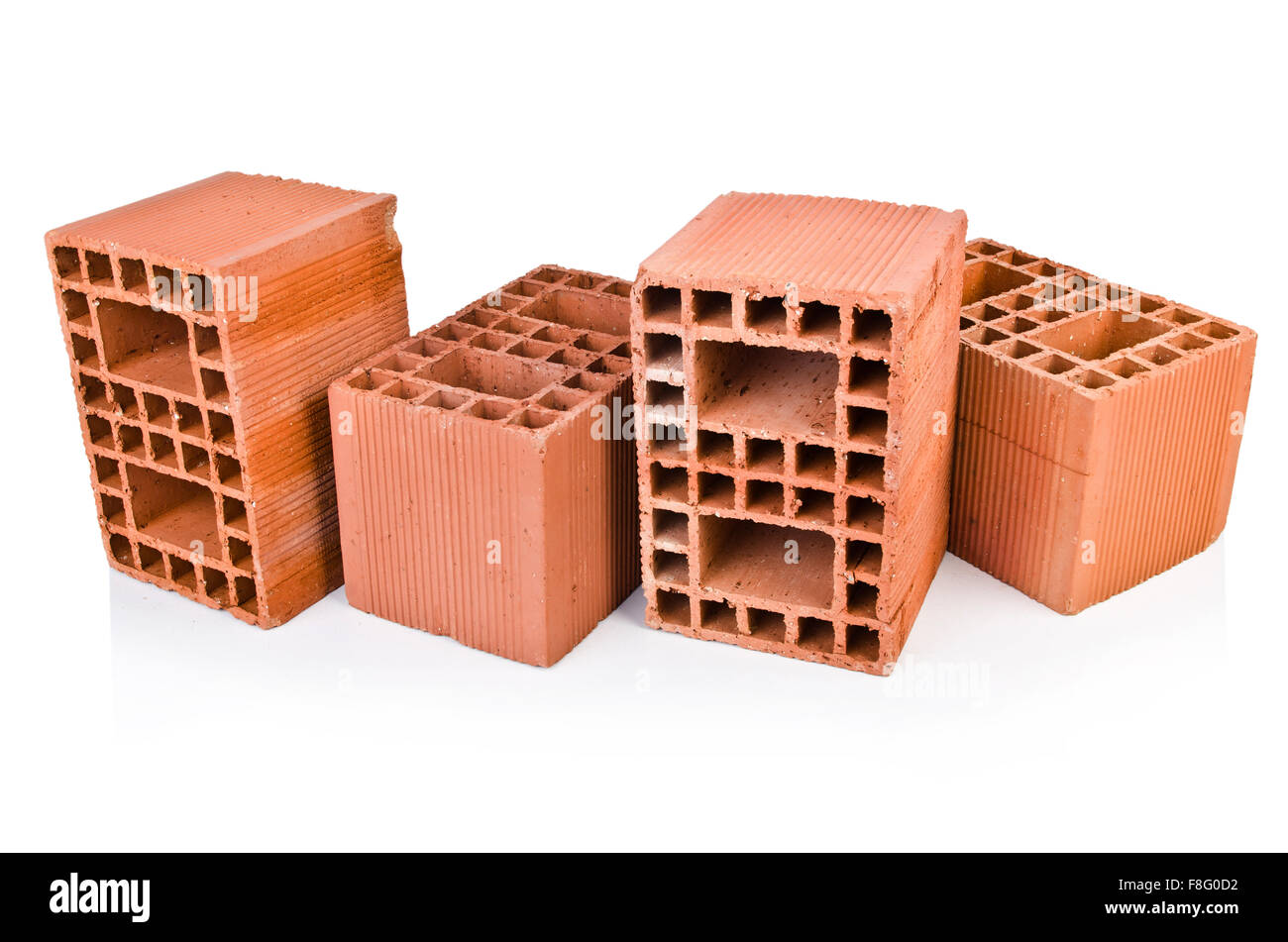 Stack of clay bricks isolated on white Stock Photo - Alamy