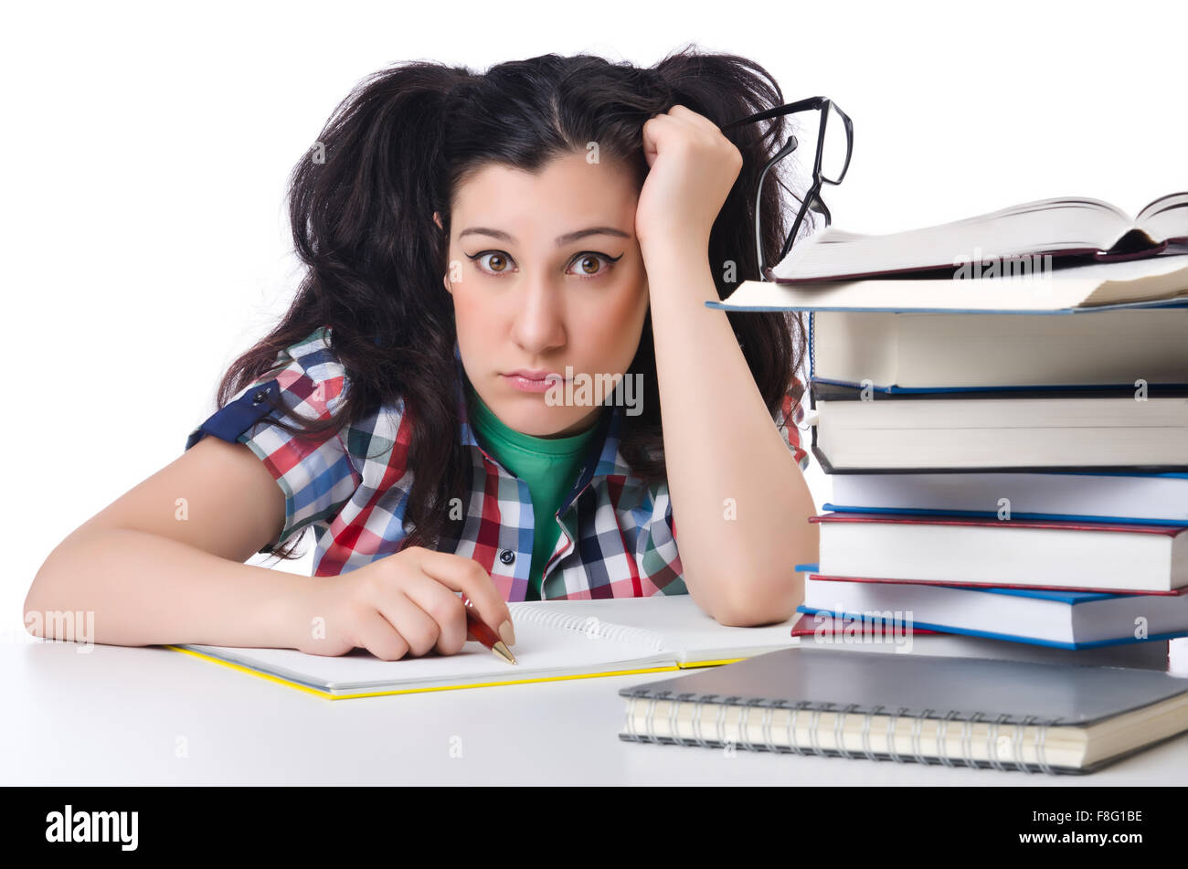 Tired student with textbooks on white Stock Photo - Alamy