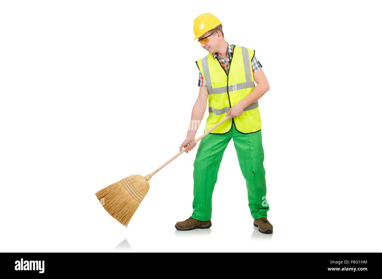 Funny janitor with broom isolated on white Stock Photo - Alamy