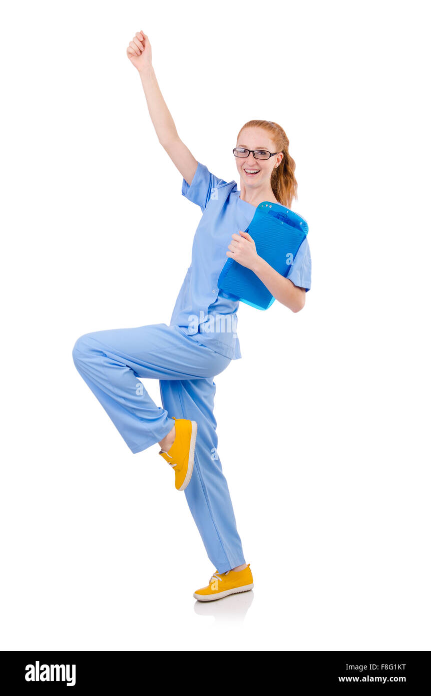 Pretty dancing doctor in blue uniform with documents isolated on white ...