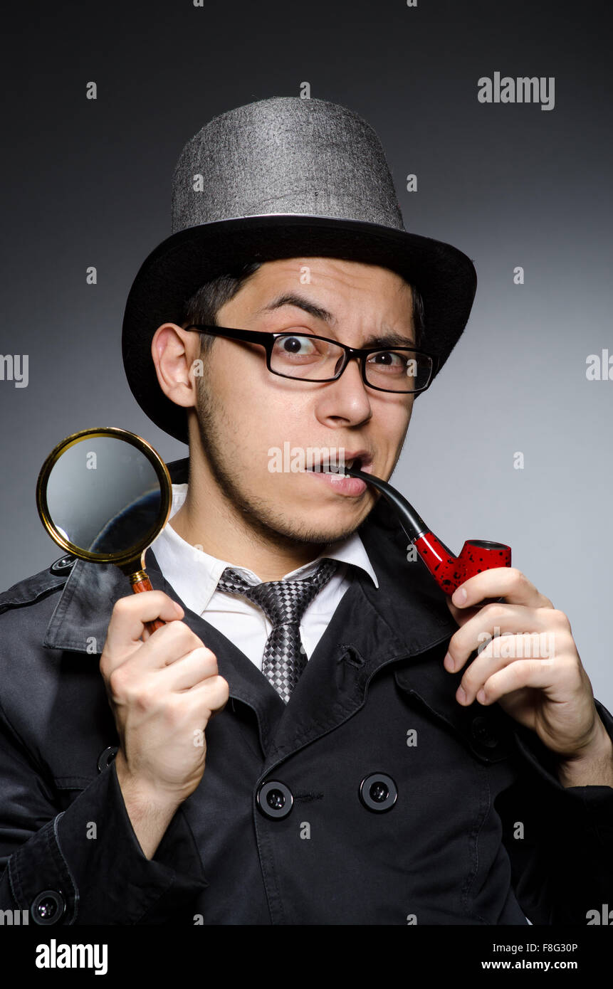 Funny detective with pipe and hat Stock Photo - Alamy
