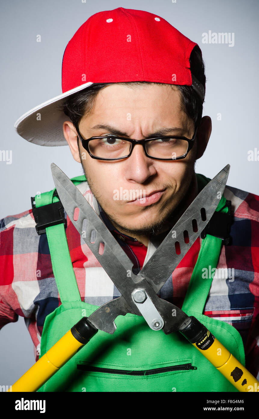 Funny man with giant shears Stock Photo - Alamy