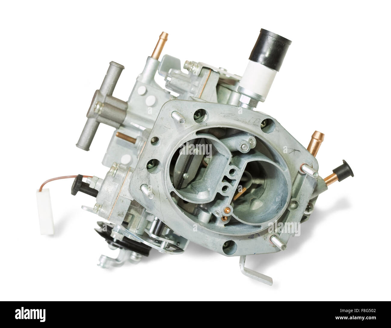 New carburetor. Isolated on white background with clipping path Stock ...