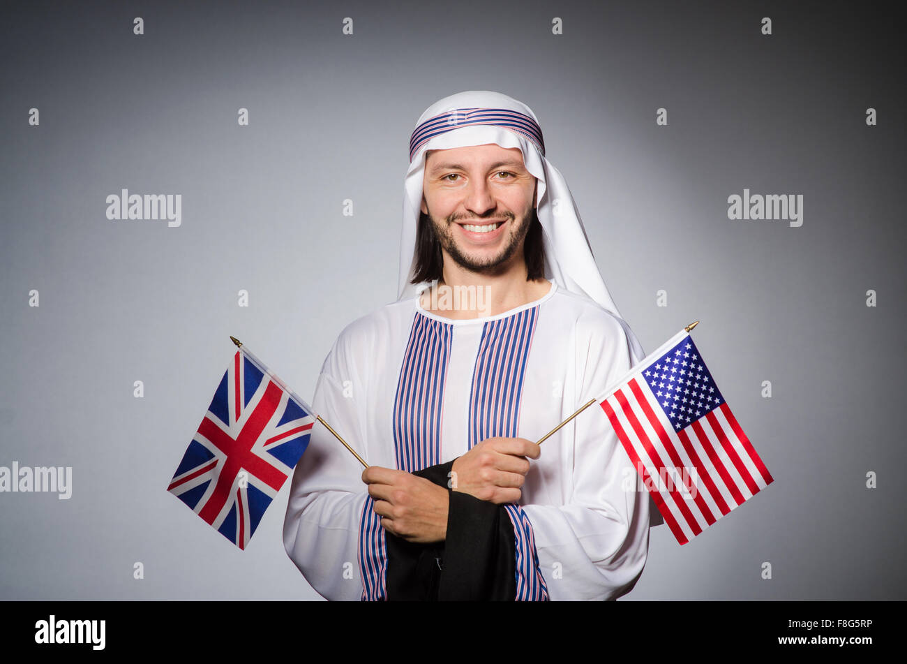Arab man with united kingdom flag Stock Photo - Alamy
