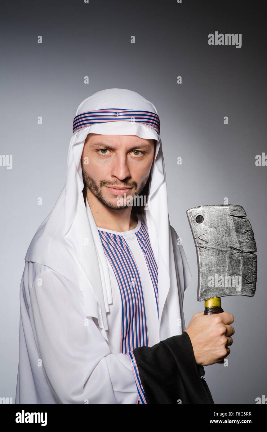 Arab man with sharp axe Stock Photo - Alamy