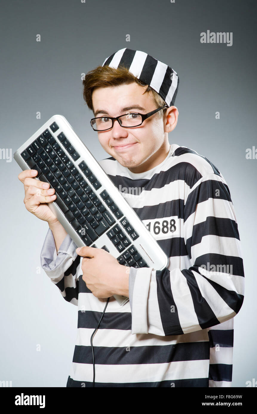 Funny prison inmate in concept Stock Photo - Alamy