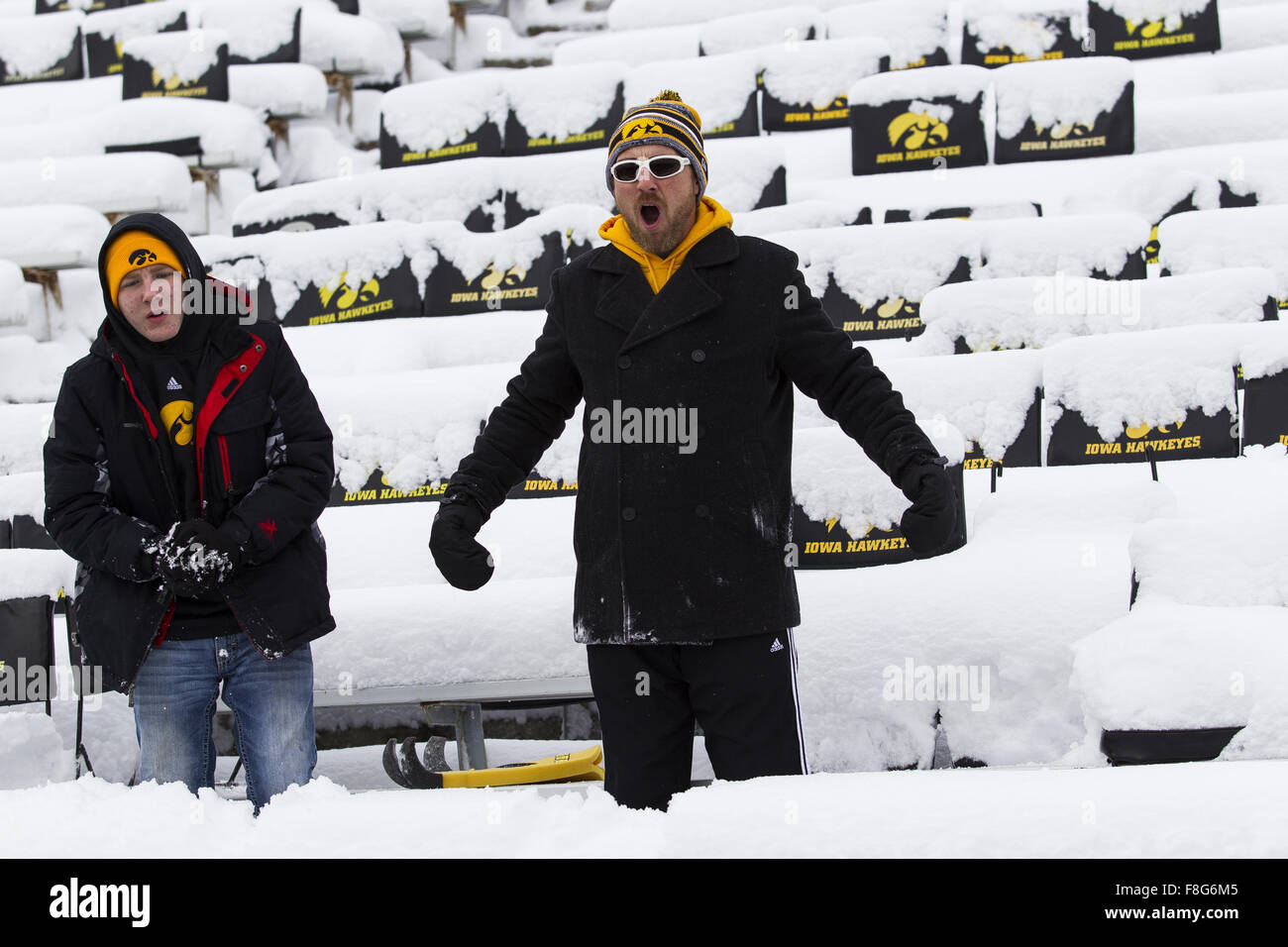 Iowa City, Iowa, USA. 21st Nov, 2015. Fans try to stay warm prior to ...