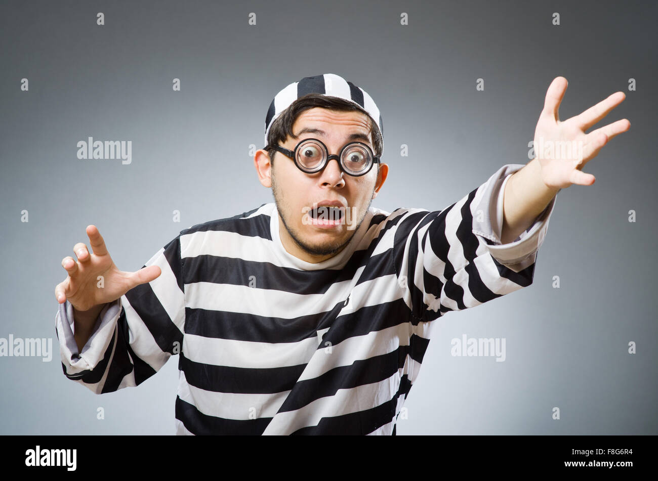 Funny prison inmate in concept Stock Photo - Alamy