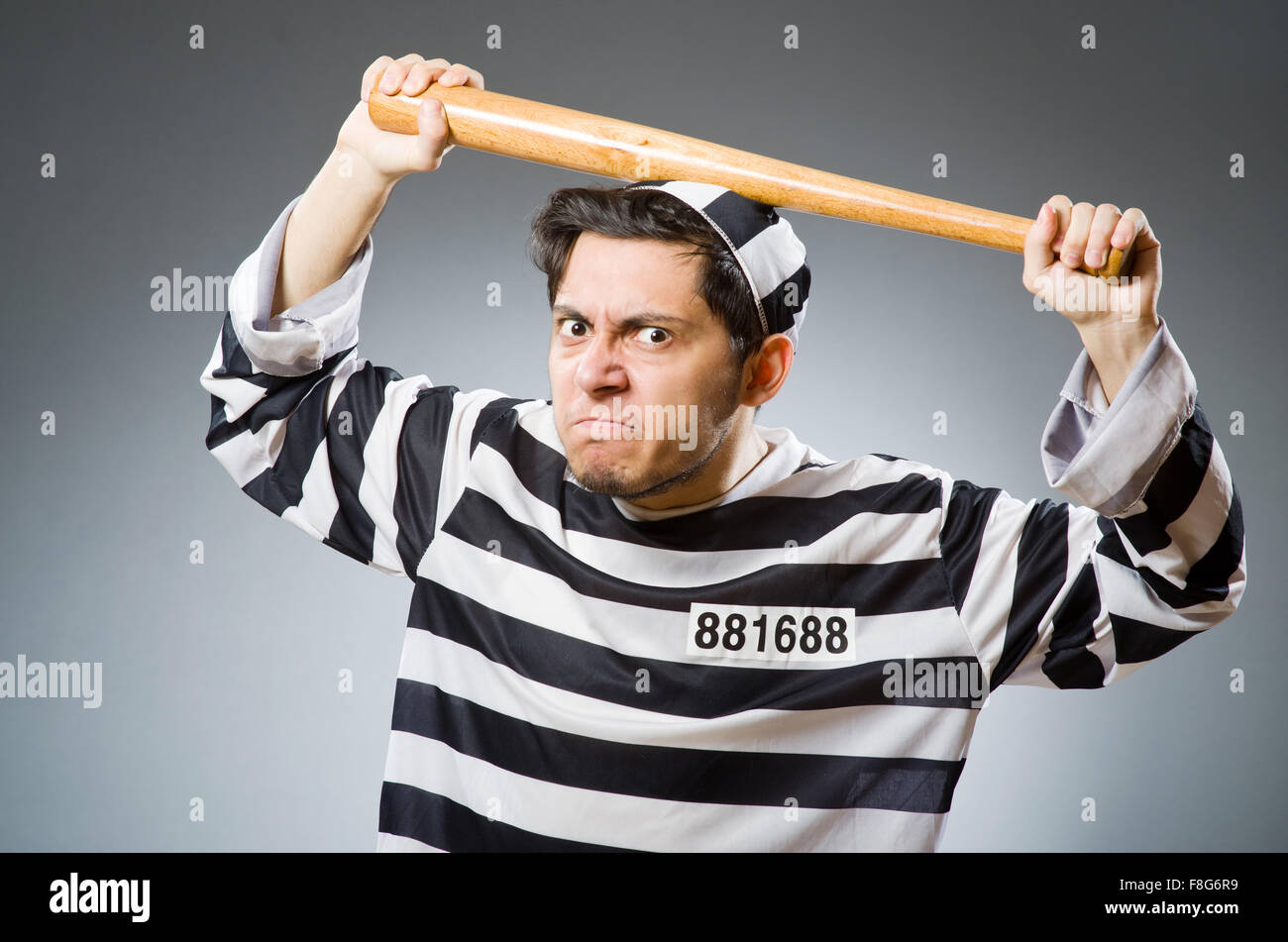 Funny prison inmate in concept Stock Photo - Alamy