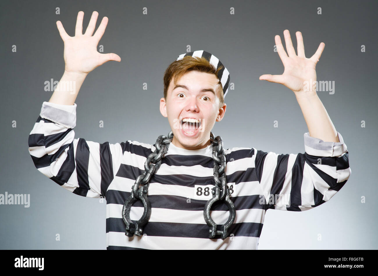 Funny prison inmate in concept Stock Photo - Alamy