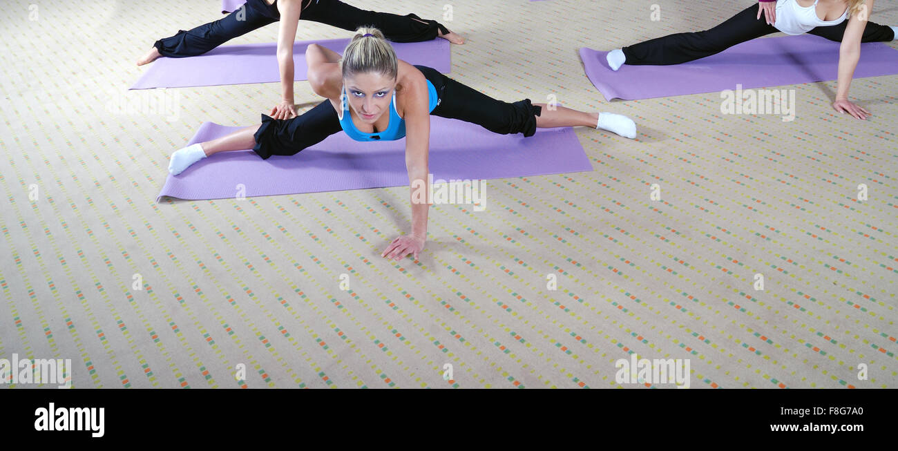 young girls group working out in fitness club Stock Photo - Alamy
