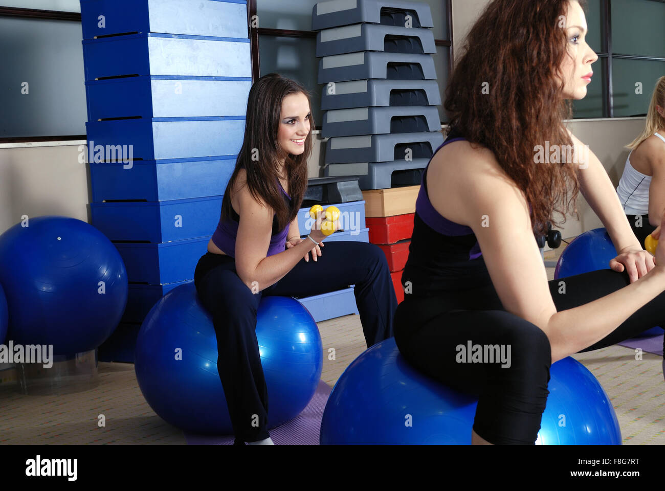beautifull young girls working out in a gym Stock Photo - Alamy