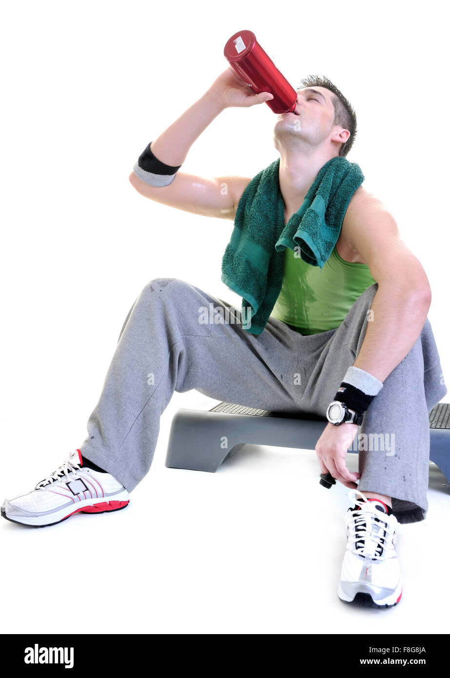 young adult man relax and drink water with sweat on body Stock Photo ...