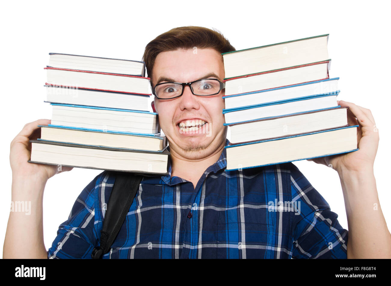 Funny student with stack of books Stock Photo - Alamy