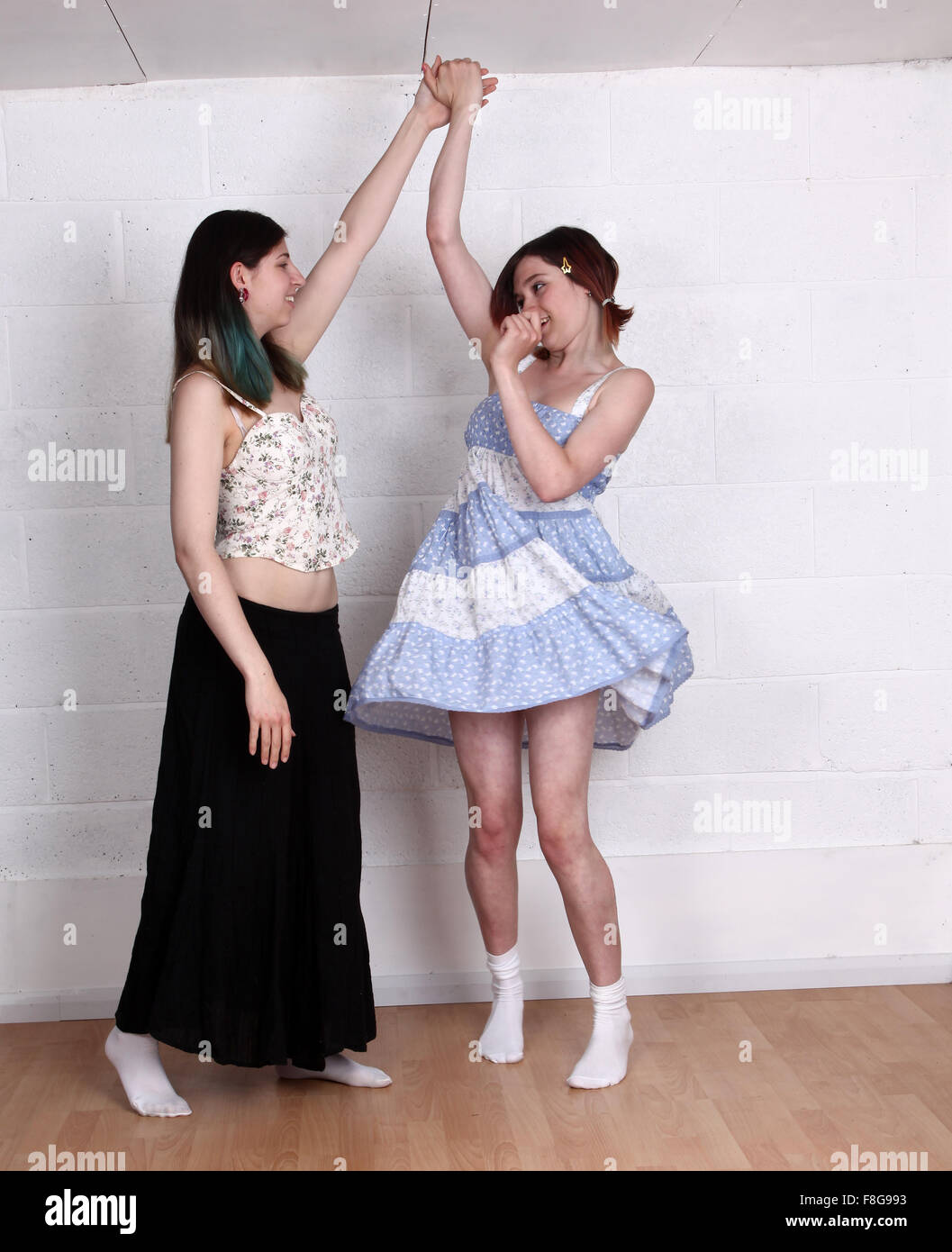 Two women dancing together hi-res stock photography and images - Alamy