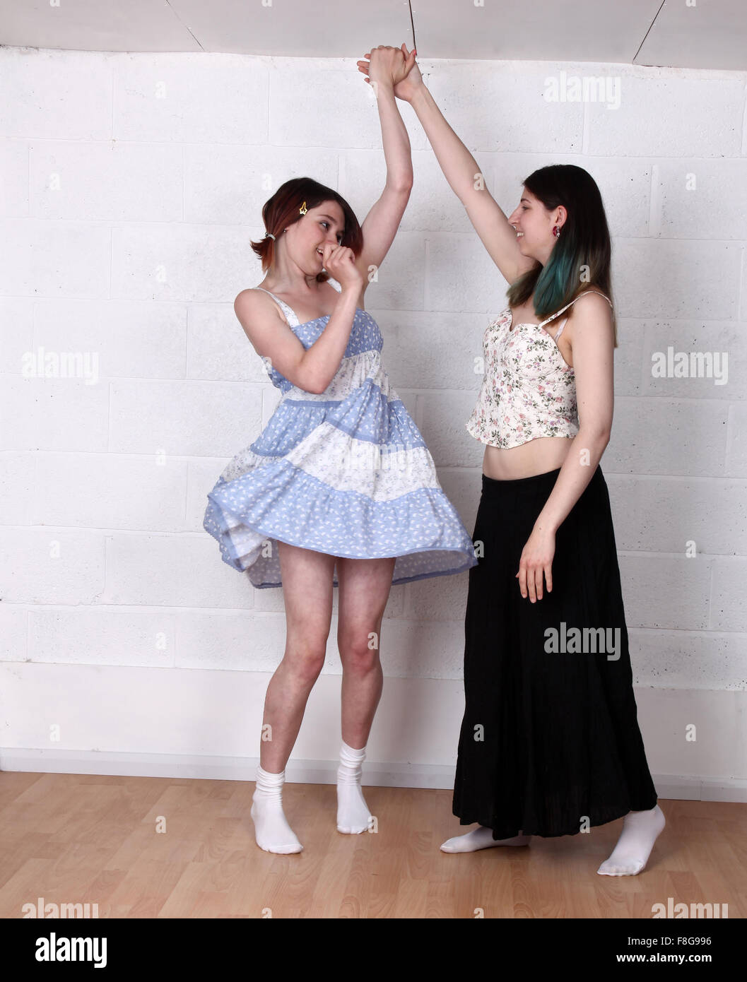 Two women dancing together hi-res stock photography and images - Alamy
