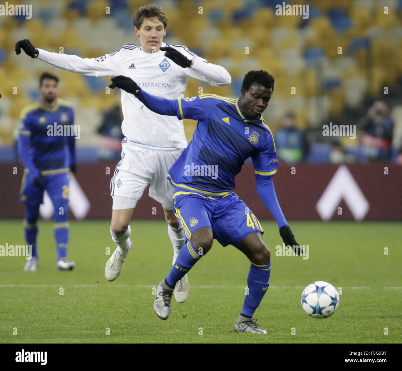 Kiev, Ukraine. 4th Dec, 2015. Denys Garmash (L) of Dynamo vies for the ...