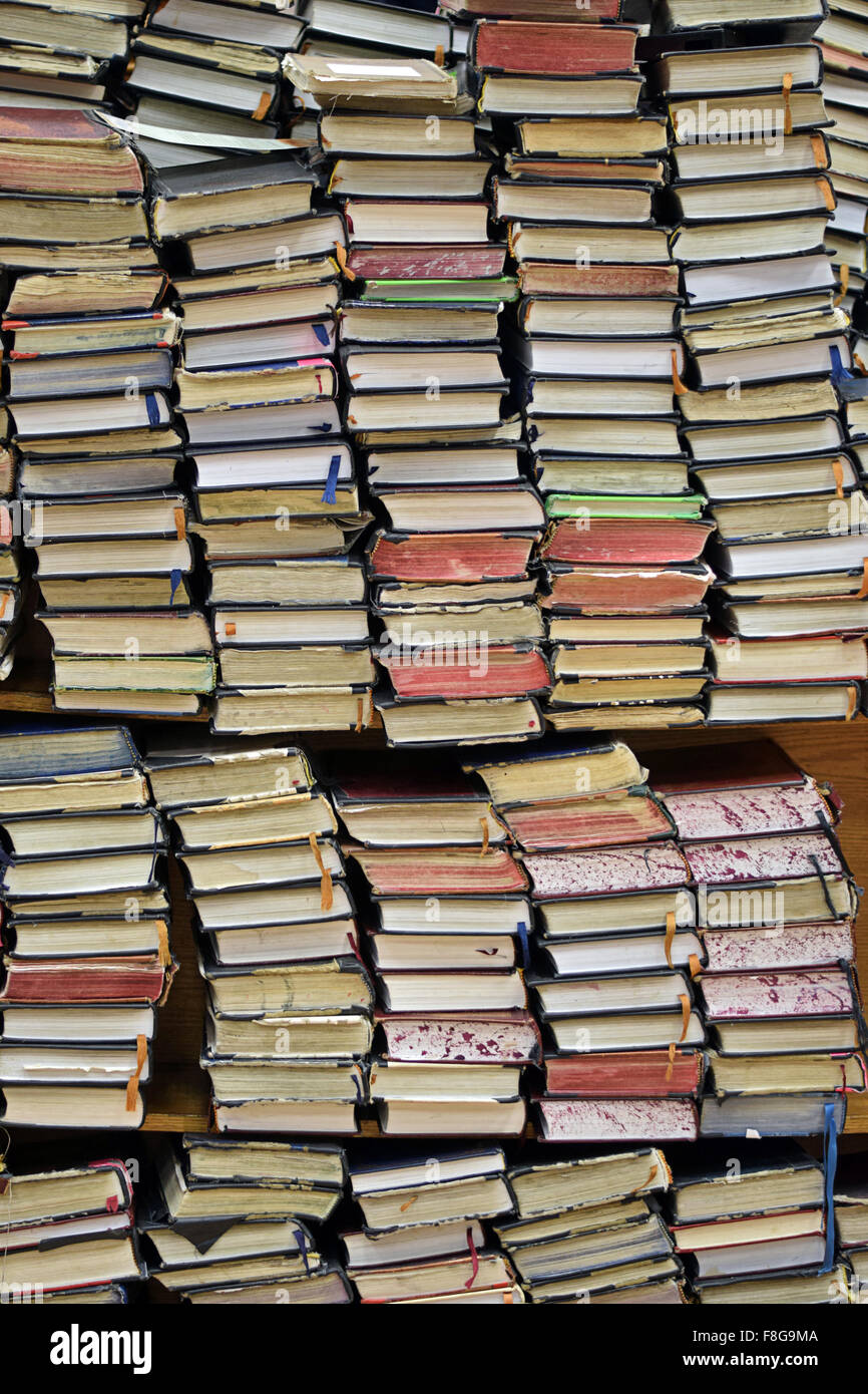 Jewish prayer book piled on bookshelves at a synagogue in Brooklyn, New ...