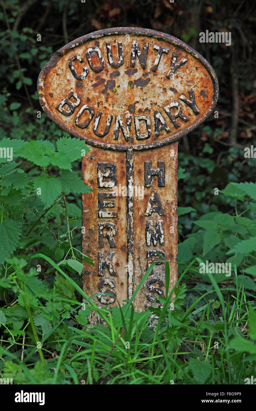 A cast iron County boundary marker once painted white with black ...