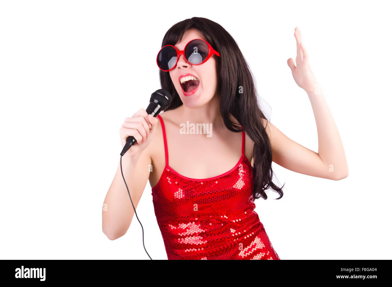 Woman in red dress singing songs Stock Photo - Alamy