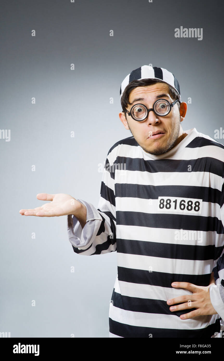 Funny prison inmate in concept Stock Photo - Alamy