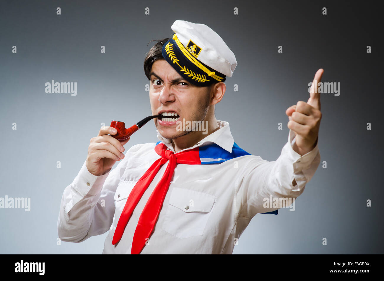 Funny captain sailor wearing hat Stock Photo - Alamy