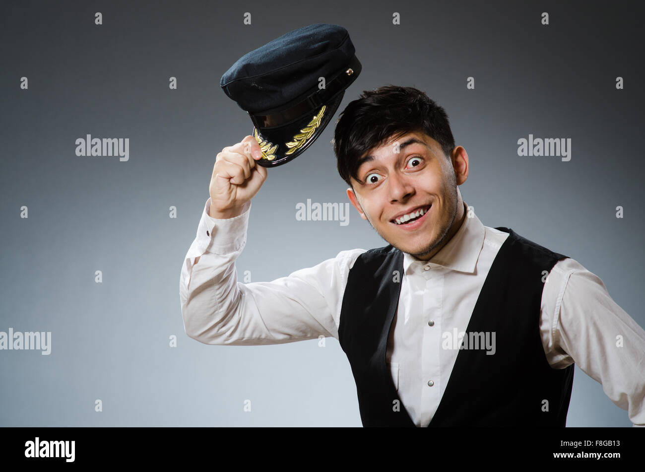 Funny taxi driver wearing peaked cap Stock Photo - Alamy