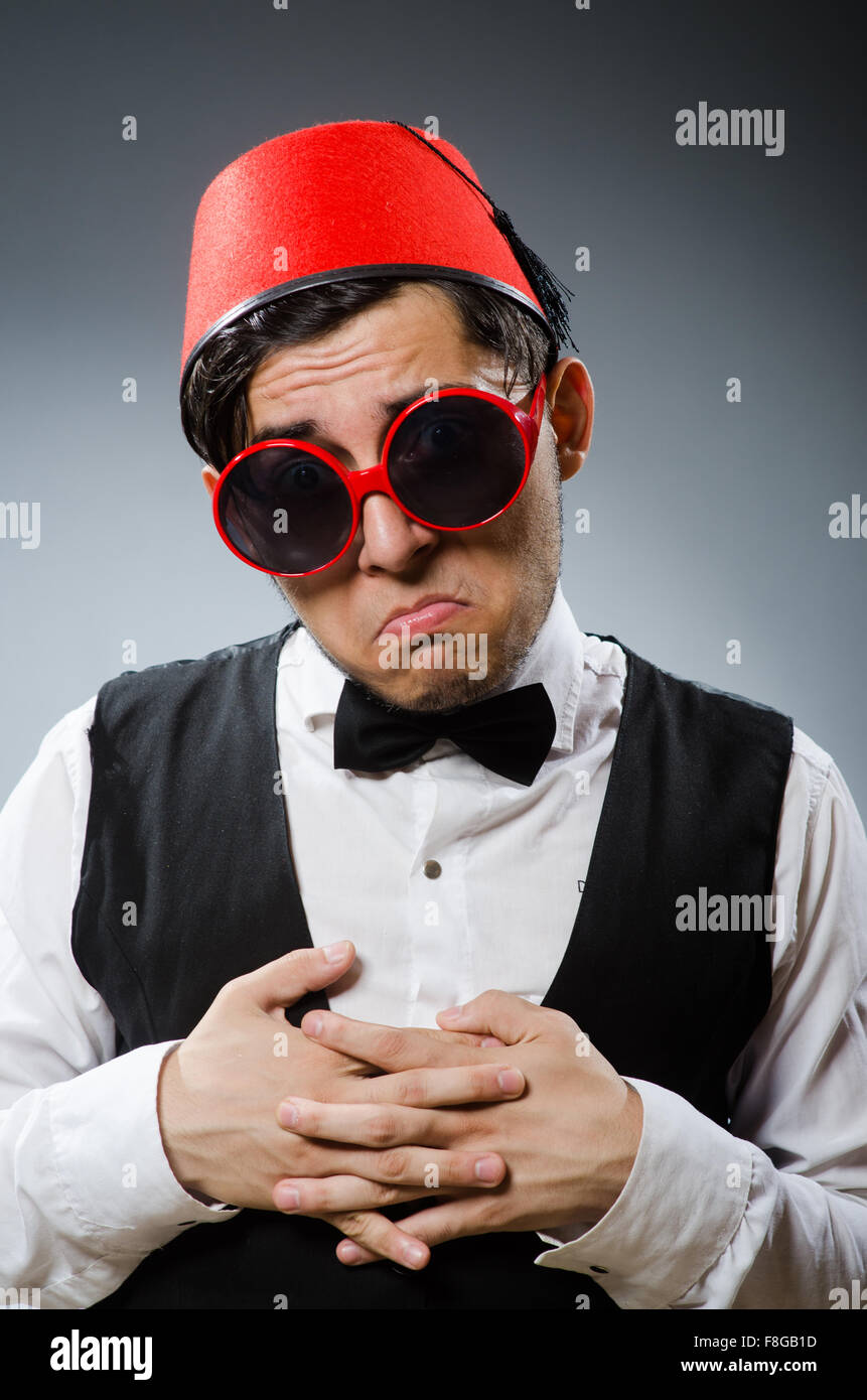 Man wearing traditional turkish hat fez Stock Photo - Alamy