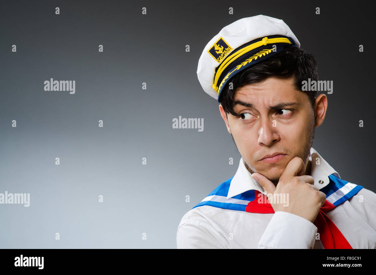Funny captain sailor wearing hat Stock Photo - Alamy