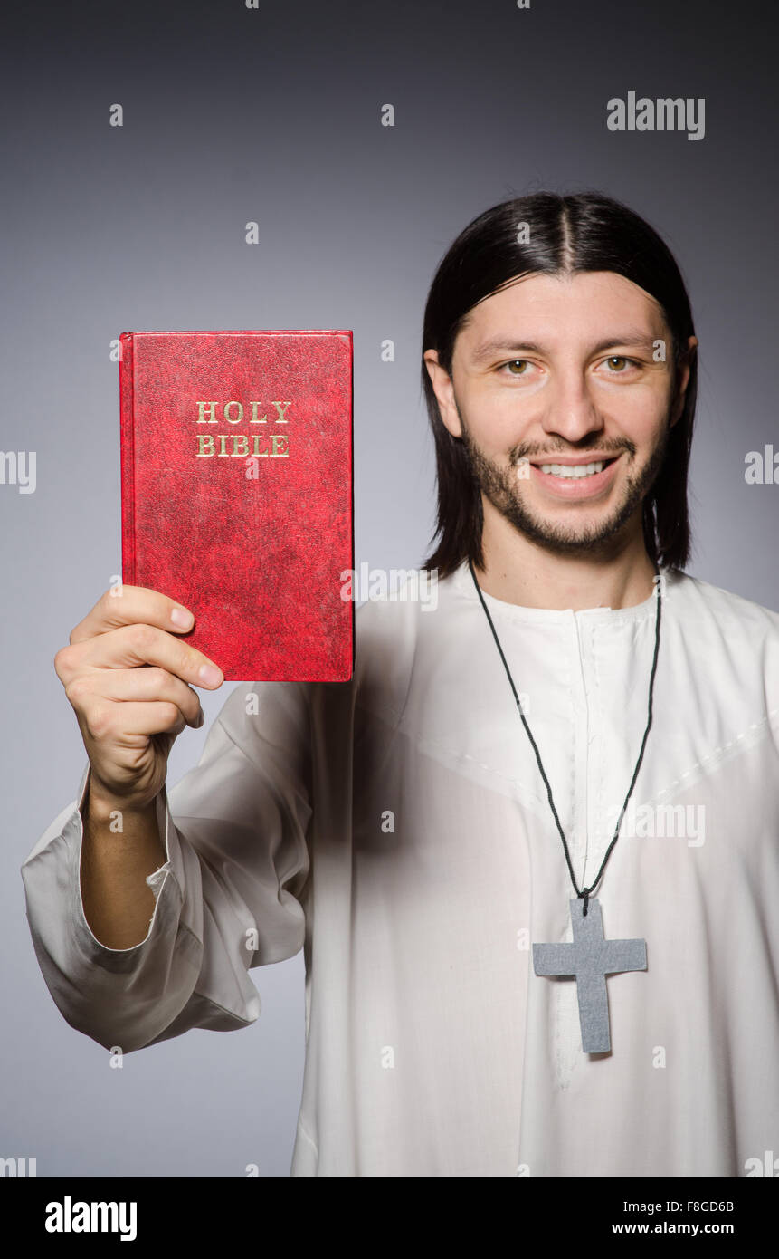 Priest man in religious concept Stock Photo - Alamy