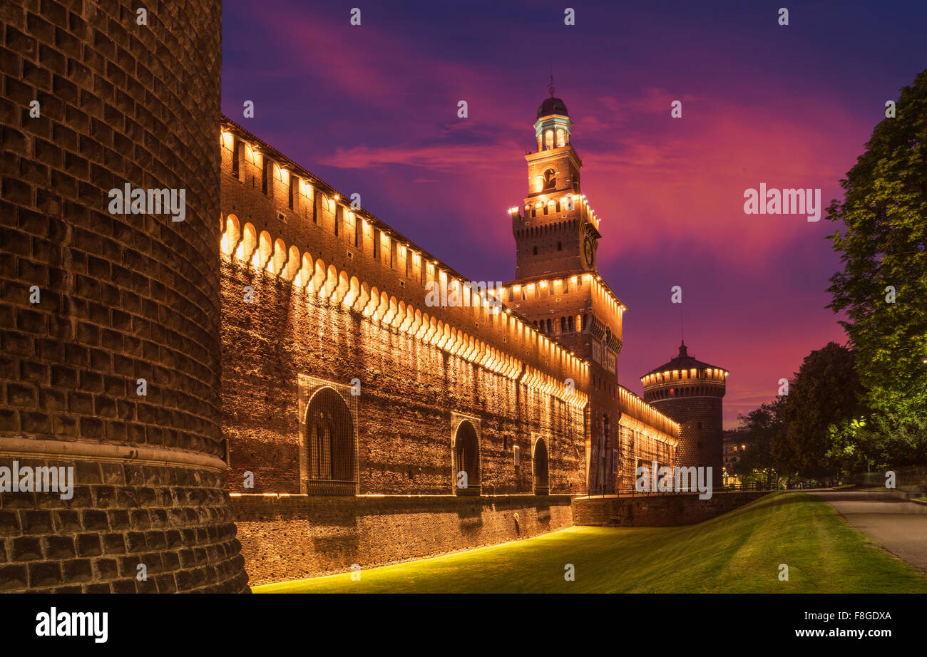 Illuminated tower and castle walls, Milano, Lombardia, Italy Stock ...