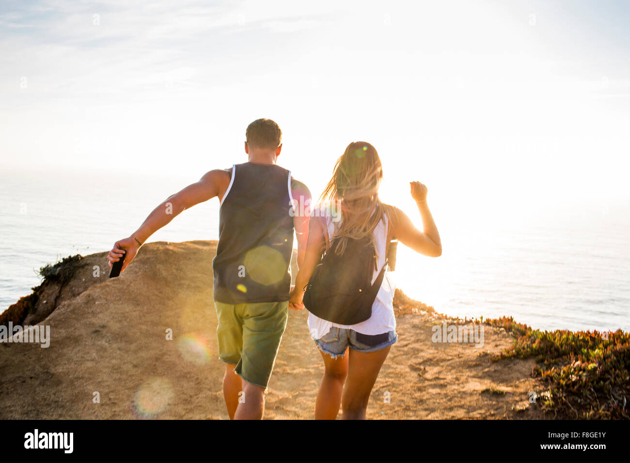 Man walking on cliff hi-res stock photography and images - Alamy