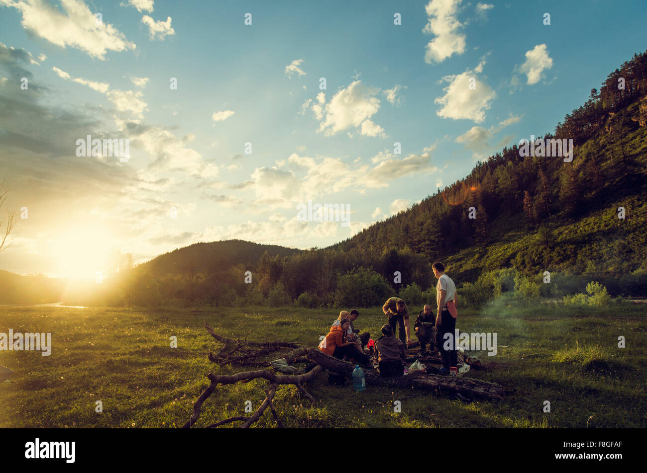 Caucasian friends in rural field Stock Photo - Alamy