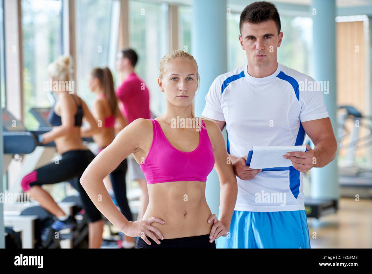 group portrait of healthy and fit young people in fitness gym Stock ...