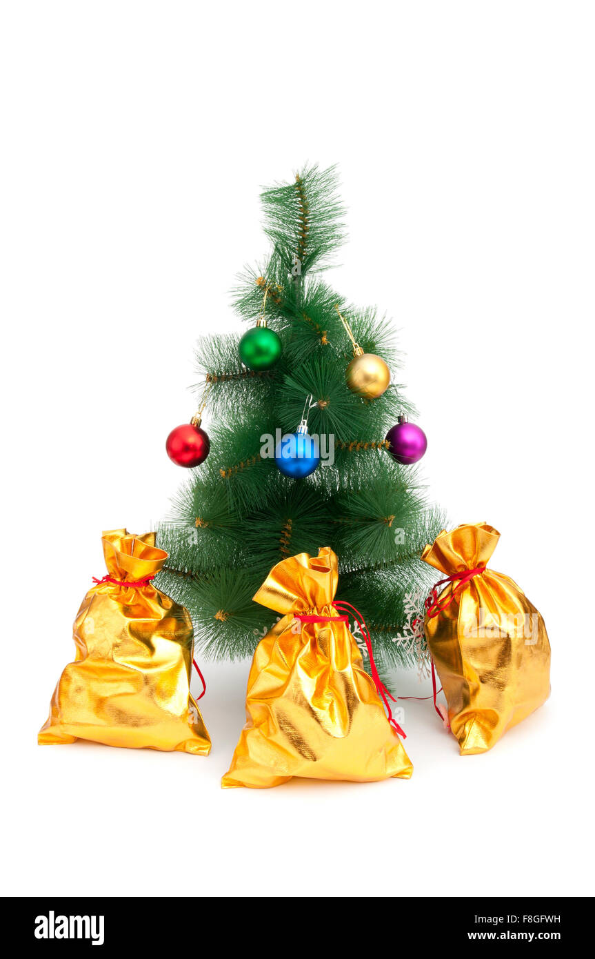 Christmas tree and golden sacks on white Stock Photo - Alamy