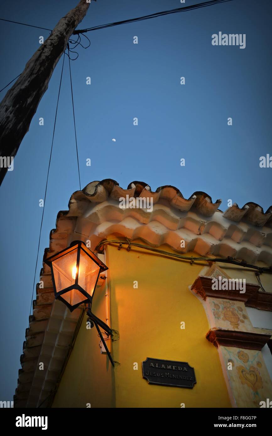 street lamp and telegraph pole in the moonlight on street corner Plaza ...