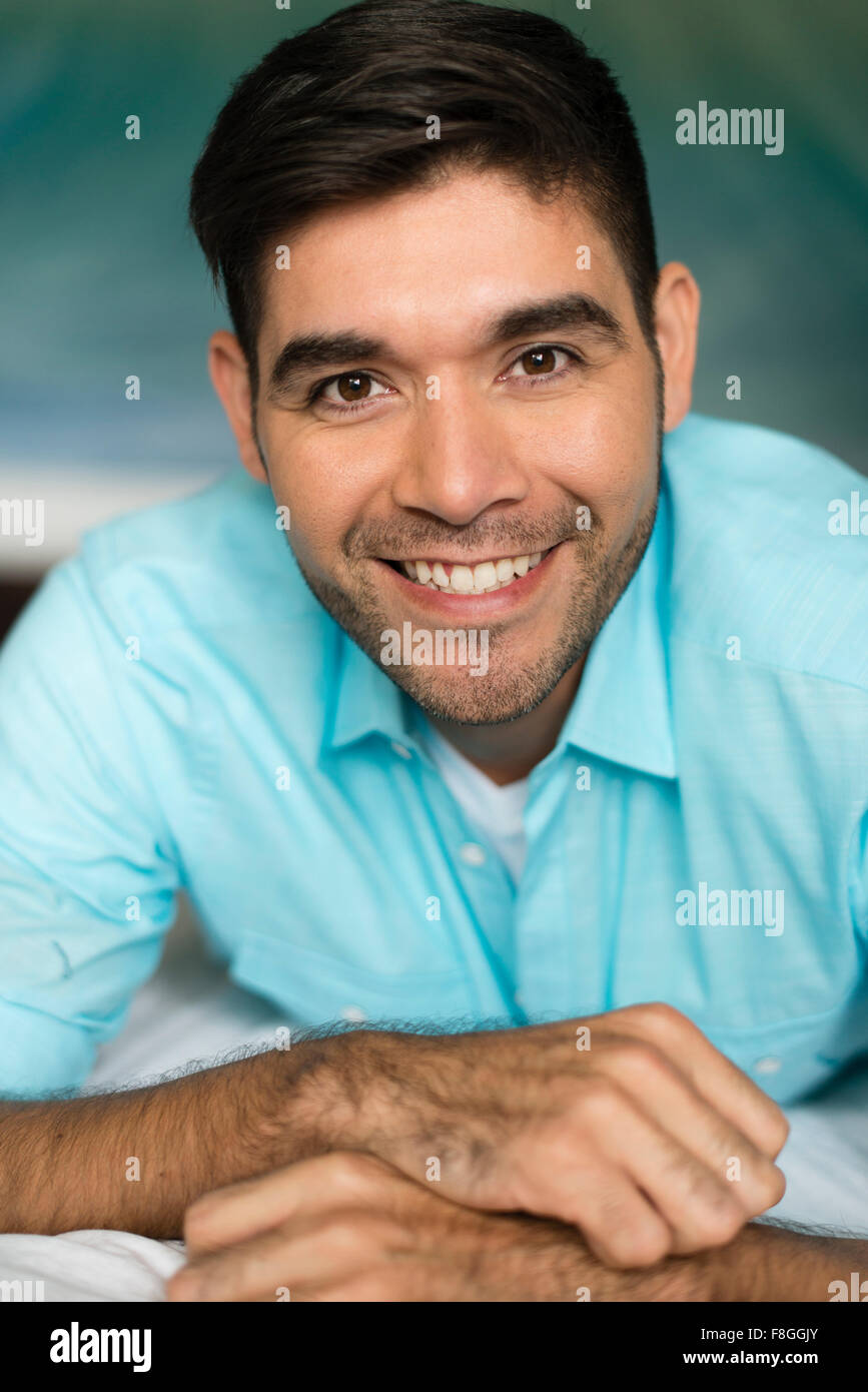 Hispanic man smiling Stock Photo - Alamy