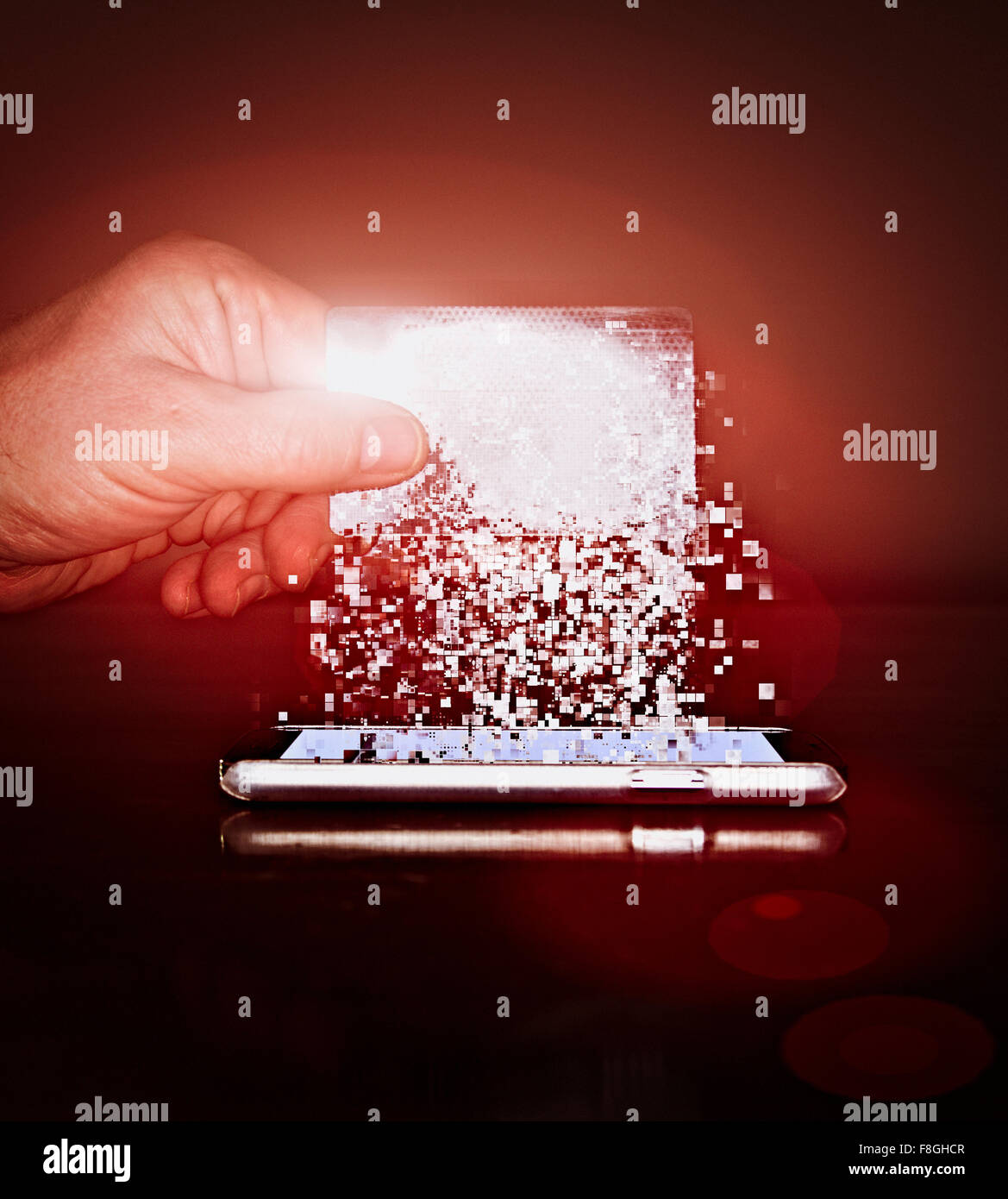 Caucasian man holding pixelated credit card Stock Photo - Alamy