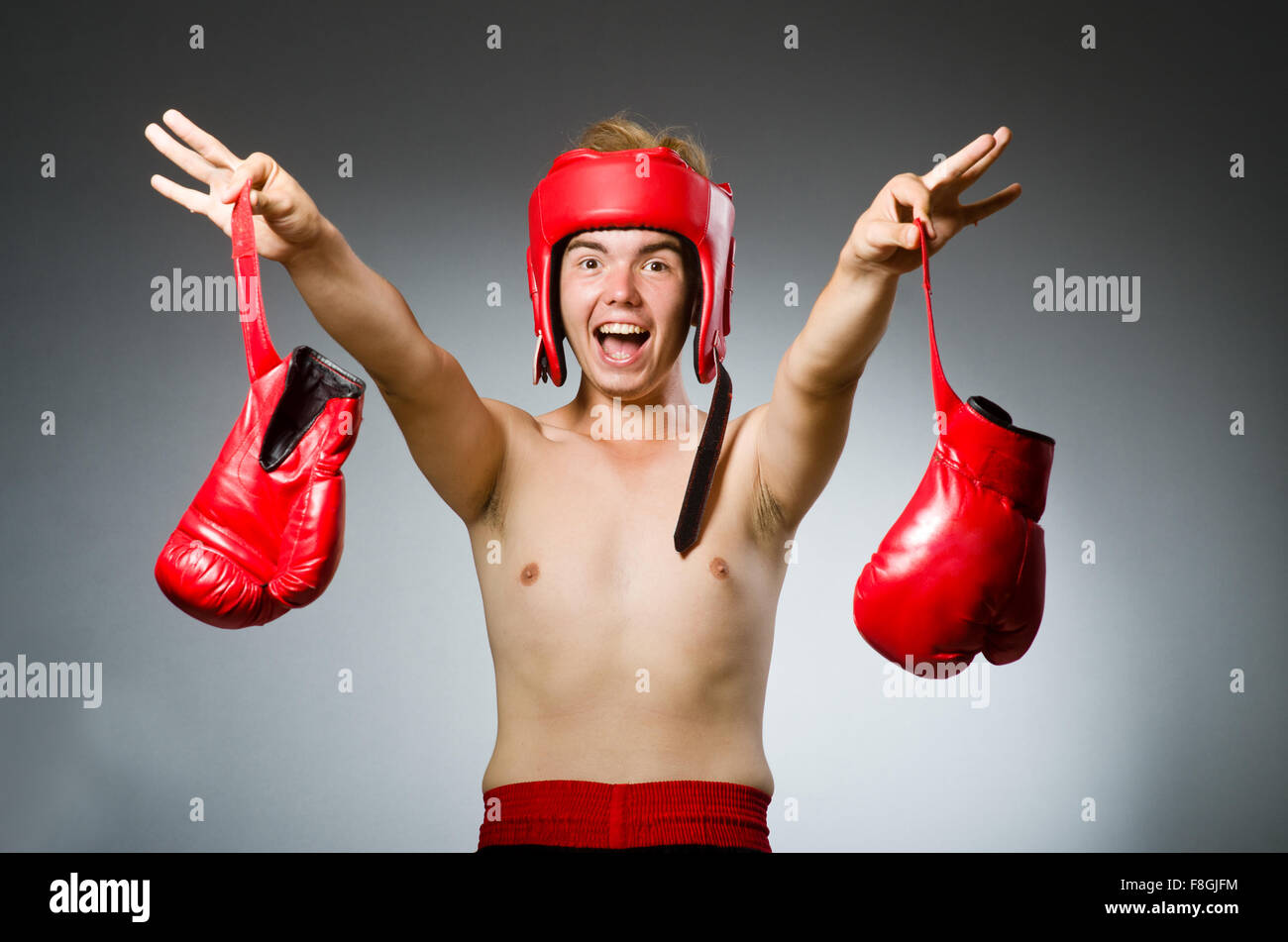 Funny boxer against dark background Stock Photo - Alamy