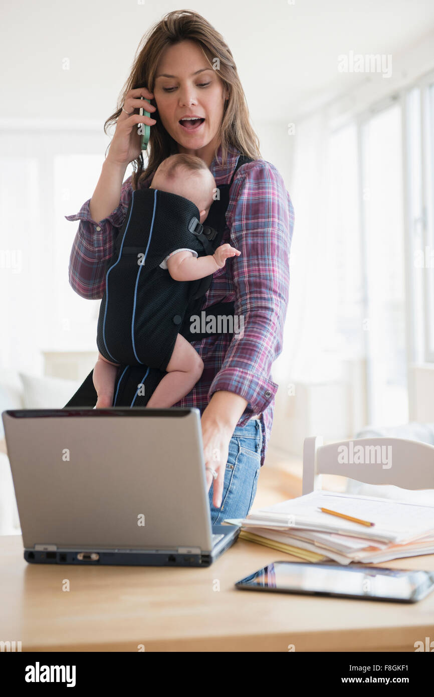 Mother baby carrier hi-res stock photography and images - Alamy
