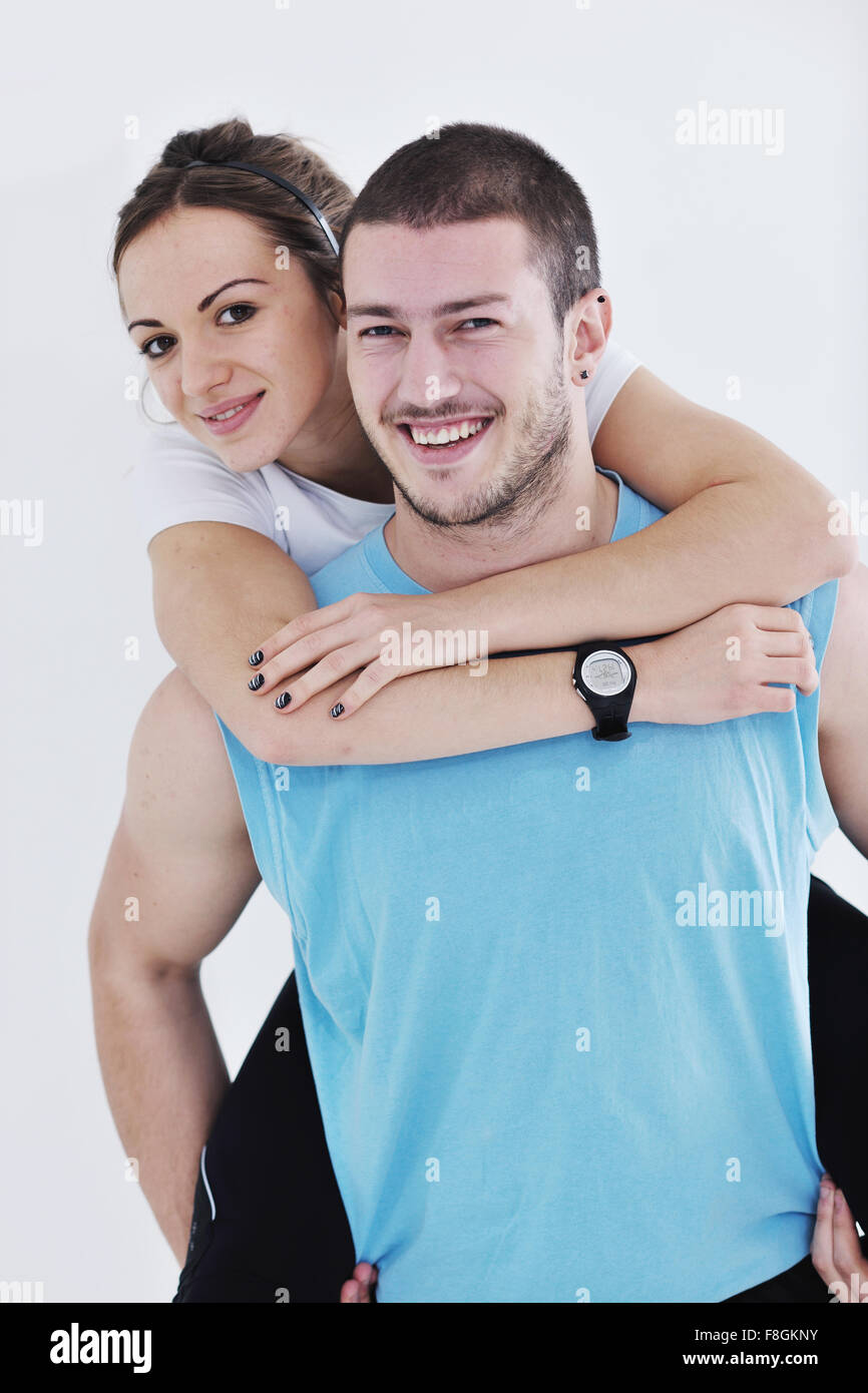 happy young couple fitness workout and fun at sport gym club Stock ...