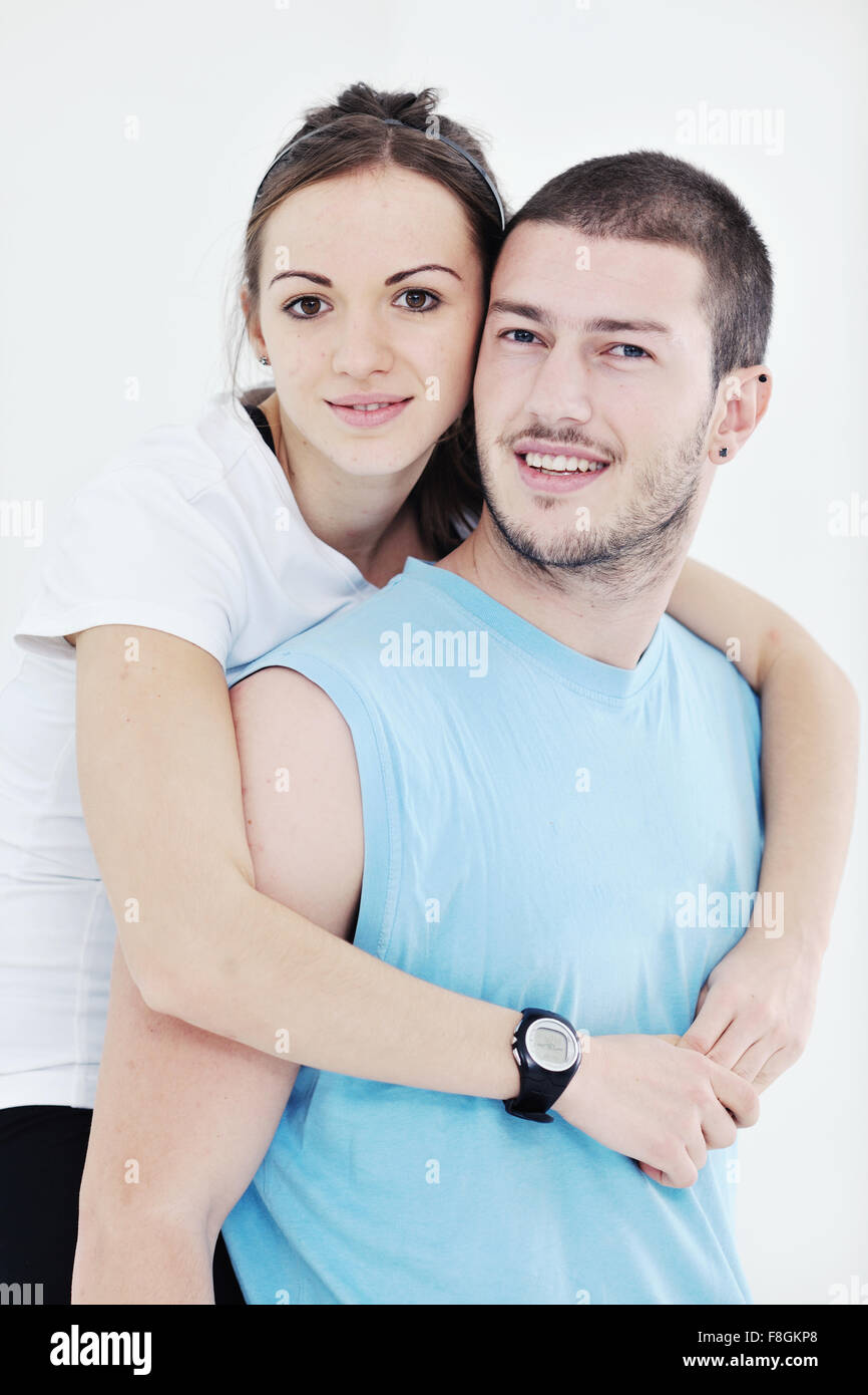 happy young couple fitness workout and fun at sport gym club Stock ...