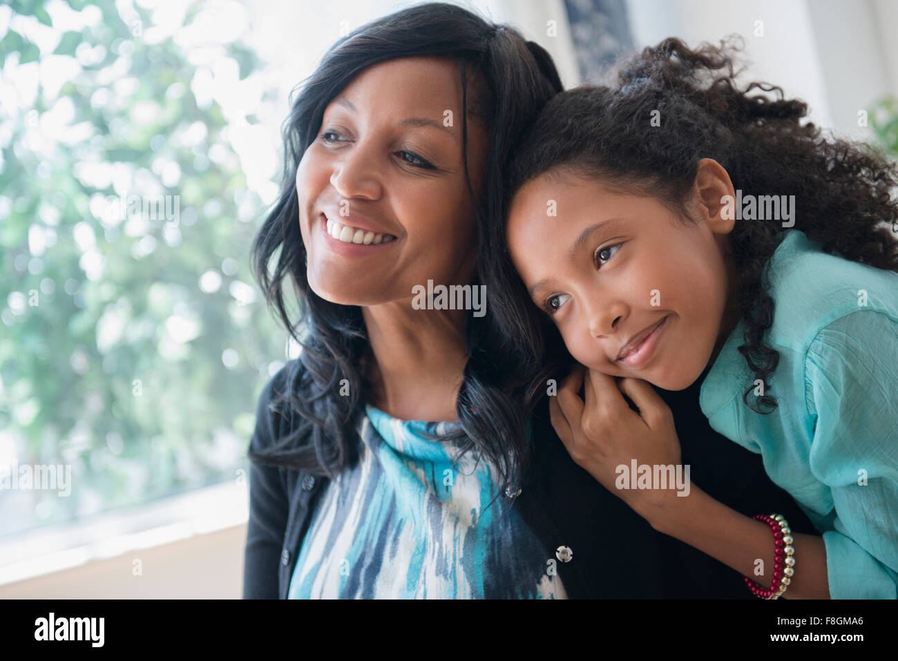 Affectionate mother and daughter hugging hi-res stock photography and images - Alamy