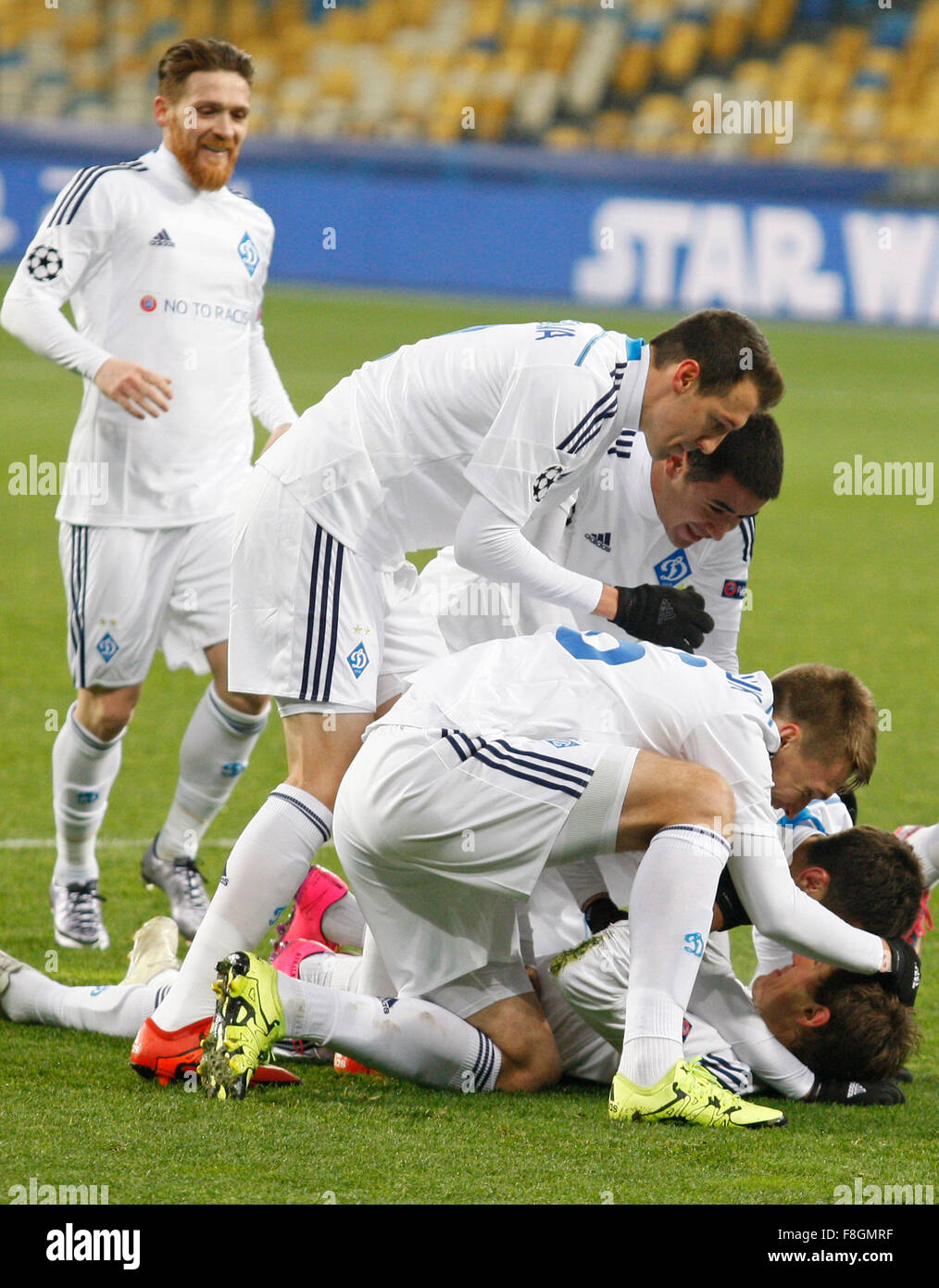 Kiev, Ukraine. 09th Dec, 2015. Dynamo players congratulate Denys ...