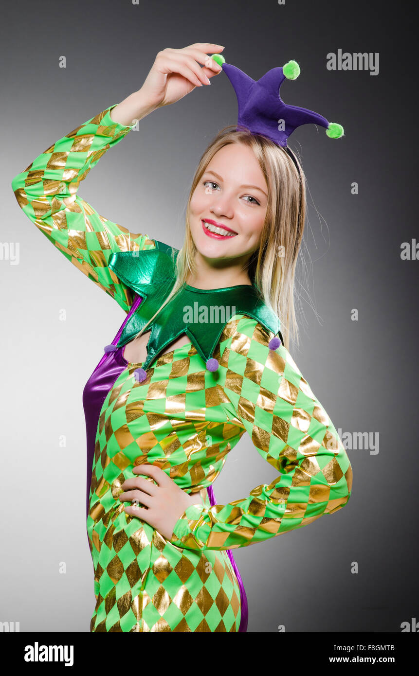 Funny clown in colourful costume Stock Photo - Alamy