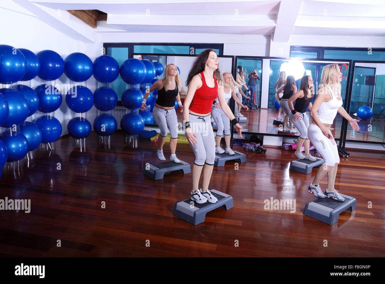 group of young girls stepping in fitness club Stock Photo - Alamy